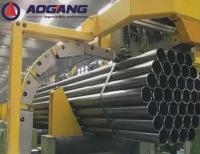 China Automatic stacking and strapping machine for sale