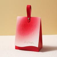China Custom Color Accepted Christmas Kraft Paper Gift Bag with Customized Logo and Color for sale