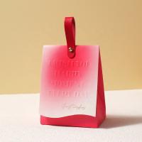 China Custom Color Accepted Christmas Kraft Paper Gift Bag with Customized Logo and Color for sale