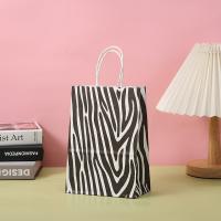 China Custom Color Leopard Print Kraft Paper Striped Cartoon Party Reception Paper Gift Bag for sale