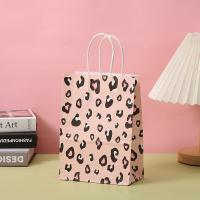 China Custom Color Leopard Print Kraft Paper Striped Cartoon Party Reception Paper Gift Bag for sale