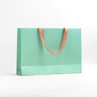 China Customized Logo Shopping Bag for Clothing Candle and Cosmetics Packaging Custom Order for sale