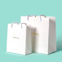 China Cardboard Custom Reusable Packaging Shopping Bag with Your Own Logo and Gravure Printing for sale