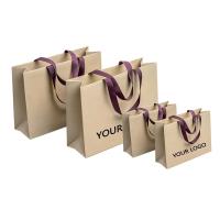 China Custom Order Accepted Luxury Paper Bags with Ribbon Handle and Your Logo on Cardboard for sale