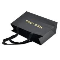 China Custom Order Accepted Luxury Paper Bags with Ribbon Handle and Your Logo on Cardboard for sale
