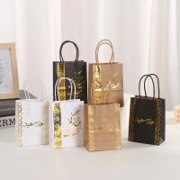 China Arabic Printed Packaging Kraft Paper Bag for Hot Stamping Festival Celebration Gift for sale