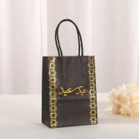 China Arabic Printed Packaging Kraft Paper Bag for Hot Stamping Festival Celebration Gift for sale