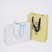 China Customized Handmade Large Portable Fashion Shopping Paper Gift Rectangular Green Bag for sale