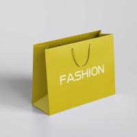 China Christmas Paper Gift Bag with Your Own Logo Made of Ivory Board and Customized Design for sale