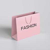 China Christmas Paper Gift Bag with Your Own Logo Made of Ivory Board and Customized Design for sale