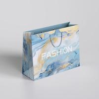 China Christmas Paper Gift Bag with Your Own Logo Made of Ivory Board and Customized Design for sale