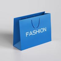 China Christmas Paper Gift Bag with Your Own Logo Made of Ivory Board and Customized Design for sale