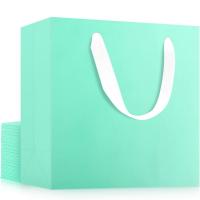 China Custom Color Accepted Ribbon Handle Paper Bag for Luxury Clothing Boutique Gifts for sale