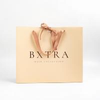 China Hand Length Handle Customized Logo Clothing Garment Peach Paper Bag with Ribbon for sale