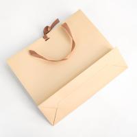 China Hand Length Handle Customized Logo Clothing Garment Peach Paper Bag with Ribbon for sale