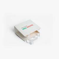 China Commercial Luxury Shopping Gift Paper Bag with Custom Uniquecolour Printing Efficiency for sale
