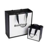 China Square Bottom Kraft Paper Gift Bags With Handles for Shopping and Cardboard Material for sale