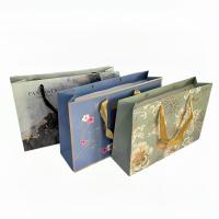 China Custom Order Accepted Hand Length Handle Paper Bag with Logo and Luxury Design for sale