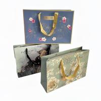 China Custom Order Accepted Hand Length Handle Paper Bag with Logo and Luxury Design for sale