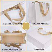 China Custom Order Accepted Luxury Gift Shopping Paper Bag With Your Own Logo On Ivory Board for sale