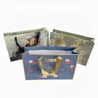China Custom Order Accepted Hand Length Handle Paper Bag with Logo and Luxury Design for sale