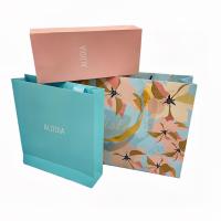 China Custom Order Accepted Hand Length Handle Paper Bag with Logo and Luxury Design for sale