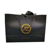 China Upgrade Your Packaging with Our Luxury Matte Black Paper Bag Industrial Gift Craft for sale