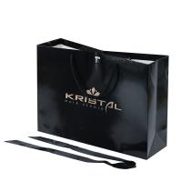 China Upgrade Your Packaging with Our Luxury Matte Black Paper Bag Industrial Gift Craft for sale