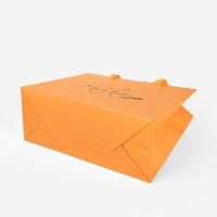 China Custom Order Sealing Handle Hand Length Handle Paper Bag with Your Logo for sale