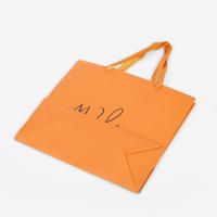 China Custom Order Sealing Handle Hand Length Handle Paper Bag with Your Logo for sale