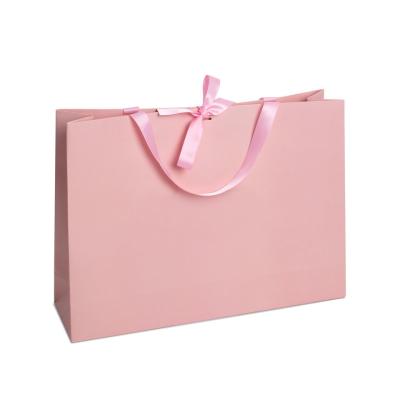 China Custom Printed Biodegradable Packaging Brown Kraft Paper Bag With Handle for Shopping for sale