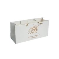 China Apparel Packaging Paper Bag with Customer's Logo and CMYK 4 Color Offset Printing for sale