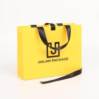 China Jewelry Gift Paper Shopping Bag with Custom Logo and Hand Length Handle Luxury Design for sale