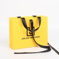 China Jewelry Gift Paper Shopping Bag with Custom Logo and Hand Length Handle Luxury Design for sale