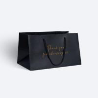 China Custom Printed Logo Luxury Gift Paper Bag with Your Own Logo Gravure Printing Handmade for sale