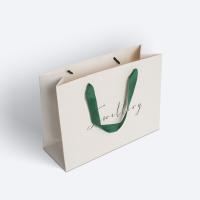 China Custom Printed Logo Luxury Gift Paper Bag with Your Own Logo Gravure Printing Handmade for sale