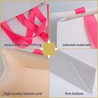 China Custom Printed Logo Luxury Gift Paper Bag with Your Own Logo Gravure Printing Handmade for sale