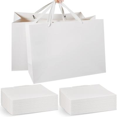 China Luxury Paper Bag Gift Packing with Customized Size and Ribbon Handle for sale