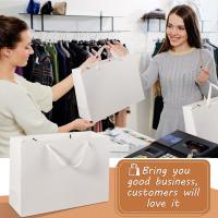 China Luxury Paper Bag Gift Packing with Customized Size and Ribbon Handle for sale