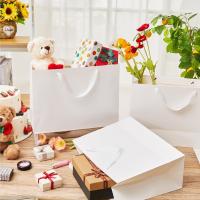 China Luxury Paper Bag Gift Packing with Customized Size and Ribbon Handle for sale