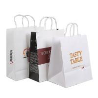 China Custom Color Accepted Brown Kraft Paper Shopping Bag with Custom Logo and Handle Printed for sale