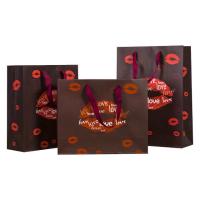China Customized Luxury Fancy Craft Gift Paper Bag with Logo Print and Gravure Printing Surface for sale