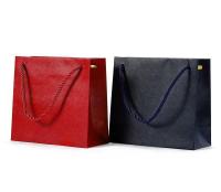 China Hand Length Handle Ivory Board Paper Shopping Bags with Custom Print and Luxury Design for sale