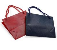 China Hand Length Handle Ivory Board Paper Shopping Bags with Custom Print and Luxury Design for sale