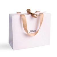 China Industrial CMYK 4 Color Offset Printing Paper Bag For Shoes Clothing With Custom Logo for sale