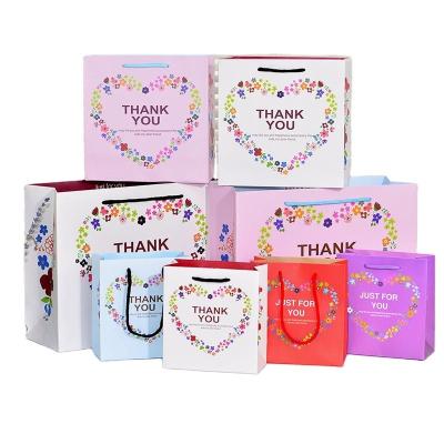 China Gravure Printing Embossing Paper Bag for Necklace Gift Shopping Custom Logo and Handle for sale