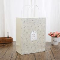 China Custom Order Luxury Kraft Paper Handle Craft Shopping Carrier Paper Bag For Gift Takeaway for sale