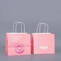 China Customized Logo Reusable Folding Shopping Kraft Paper Bag with and Hand Length Handle for sale
