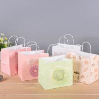 China Customized Logo Reusable Folding Shopping Kraft Paper Bag with and Hand Length Handle for sale