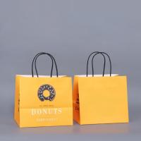 China Customized Logo Reusable Folding Shopping Kraft Paper Bag with and Hand Length Handle for sale